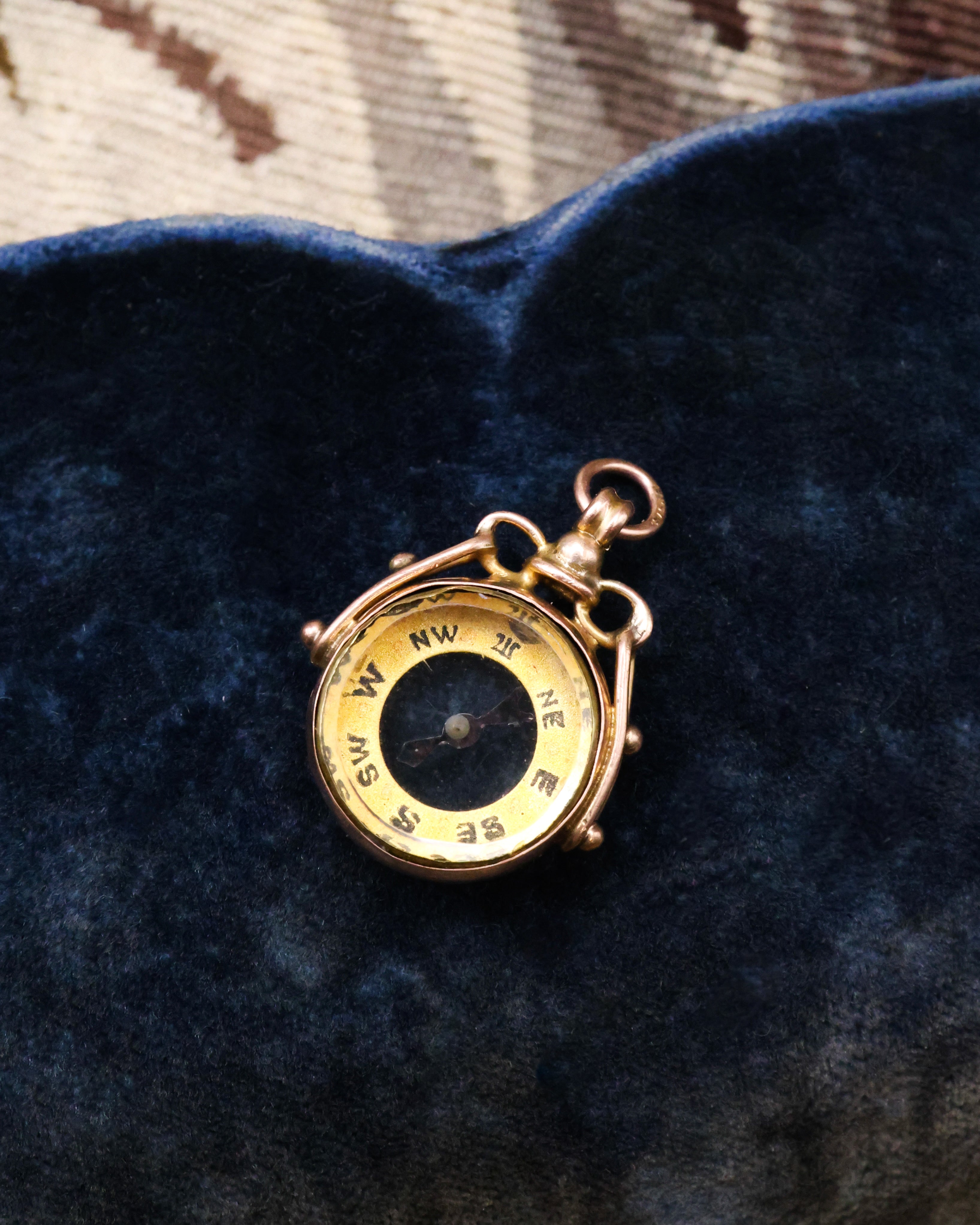 A very fine 9 Carat Yellow Gold, double sided Compass, with an open ...