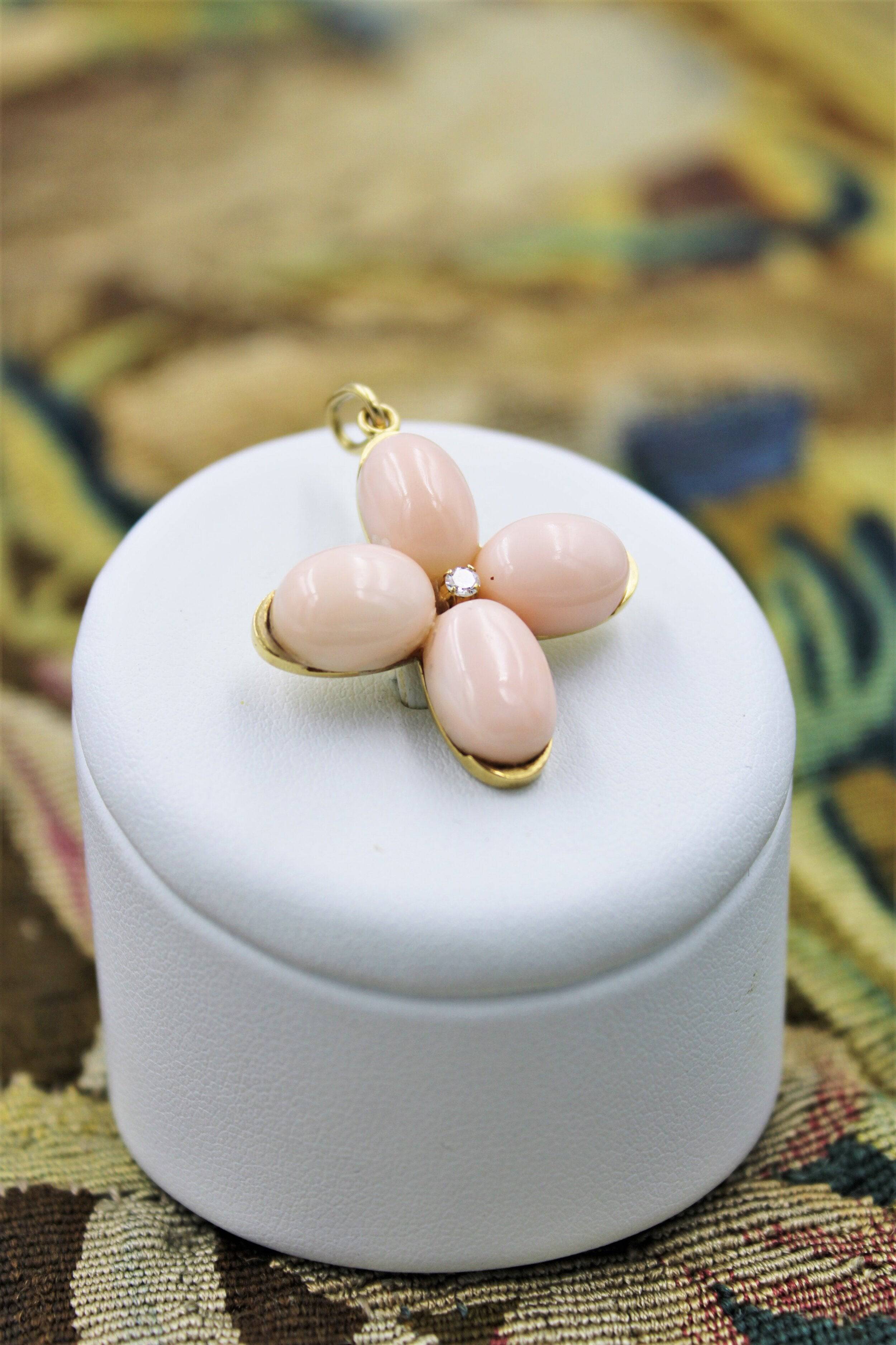 A very fine Coral and Diamond Pendant mounted in 18 Carat Yellow Gold ...